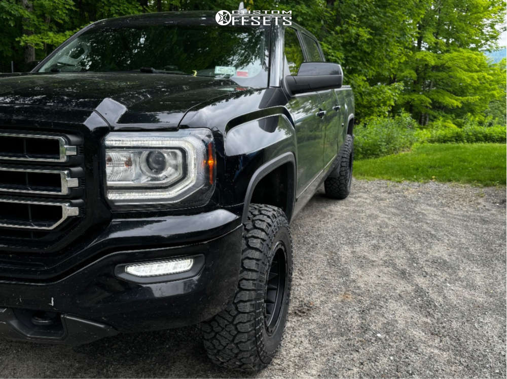 2017 GMC Sierra 1500 with 17x9 -12 KMC Km542 and 33/10.5R17 Kenda ...