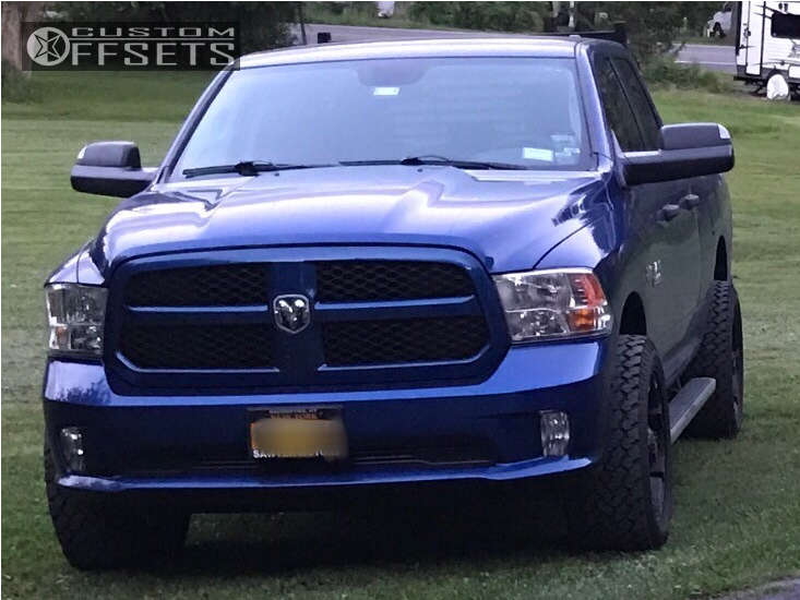 2014 Ram 1500 with 20x10 -19 Ballistic Morax and 305/50R20 General ...
