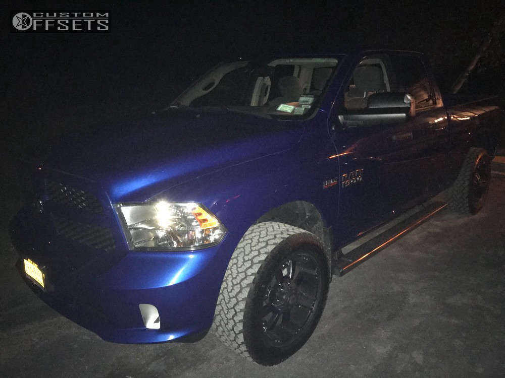 2014 Ram 1500 with 20x10 -19 Ballistic Morax and 305/50R20 General ...