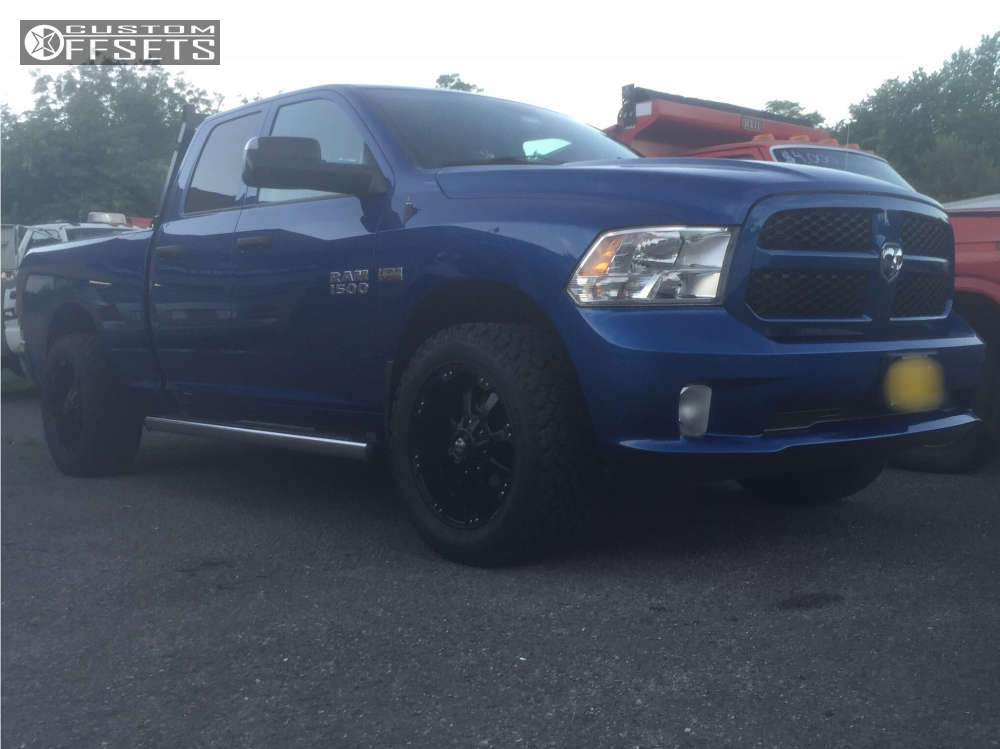 2014 Ram 1500 with 20x10 -19 Ballistic Morax and 305/50R20 General ...