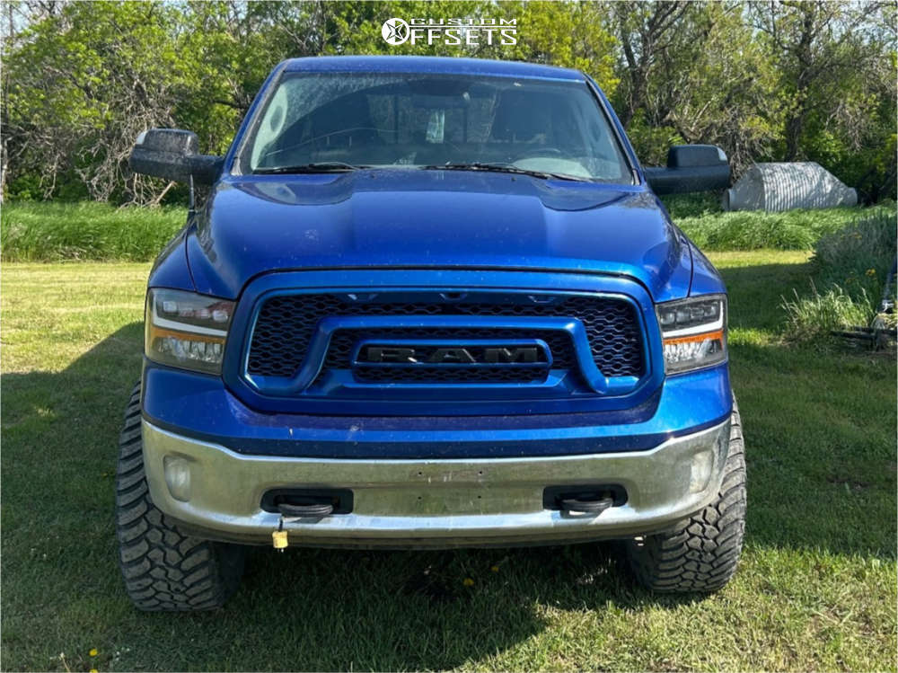 2016 Ram 1500 with 22x12 -44 XF Offroad Xf-230 and 37/12.5R22 AMP Mud ...