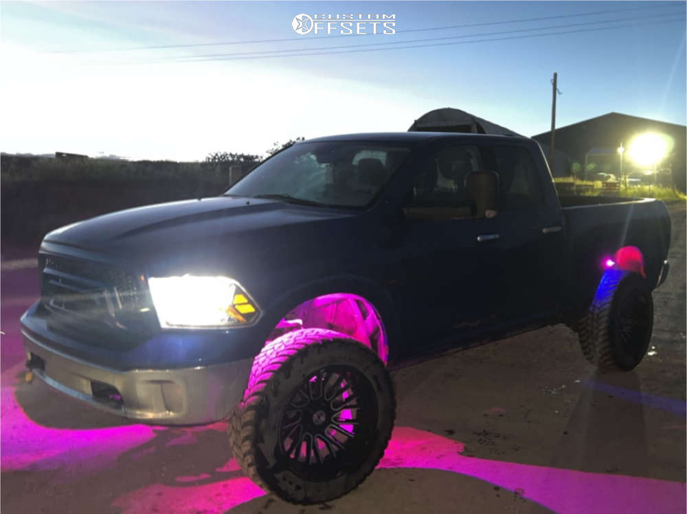 2016 Ram 1500 with 22x12 -44 XF Offroad Xf-230 and 37/12.5R22 AMP Mud ...