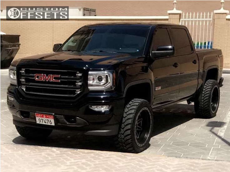 2017 GMC Sierra 1500 with 22x12 -44 Fuel Hostage Ii and 33/12.5R22 AMP Mud Terrain Attack MT A ...