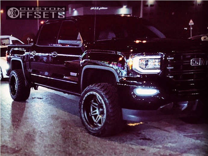 2017 GMC Sierra 1500 with 22x12 -44 Fuel Hostage Ii and 33/12.5R22 AMP Mud Terrain Attack MT A ...