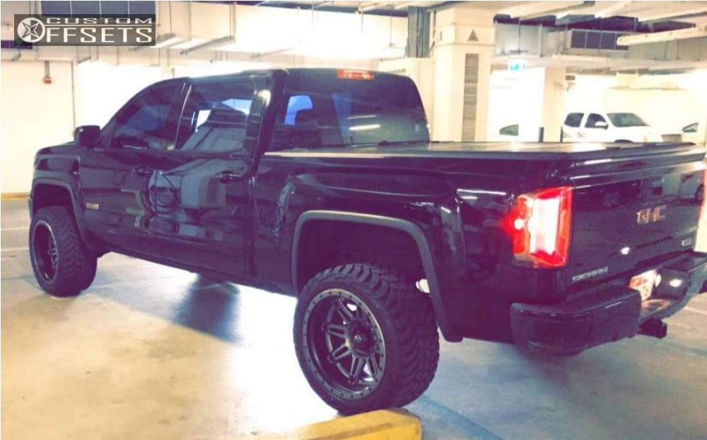 2017 GMC Sierra 1500 with 22x12 -44 Fuel Hostage Ii and 33/12.5R22 AMP Mud Terrain Attack MT A ...