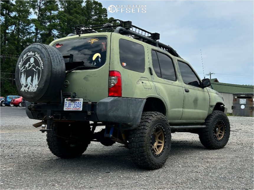 2003 Nissan Xterra with 17x9 -12 Method Mr312 and 285/70R17 Kenda ...