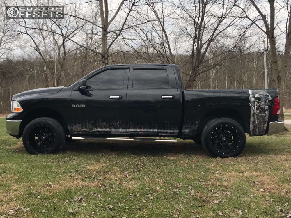2009 Dodge Ram 1500 with 20x12 -44 TIS 535B and 305/50R20 Nitto NT420V ...