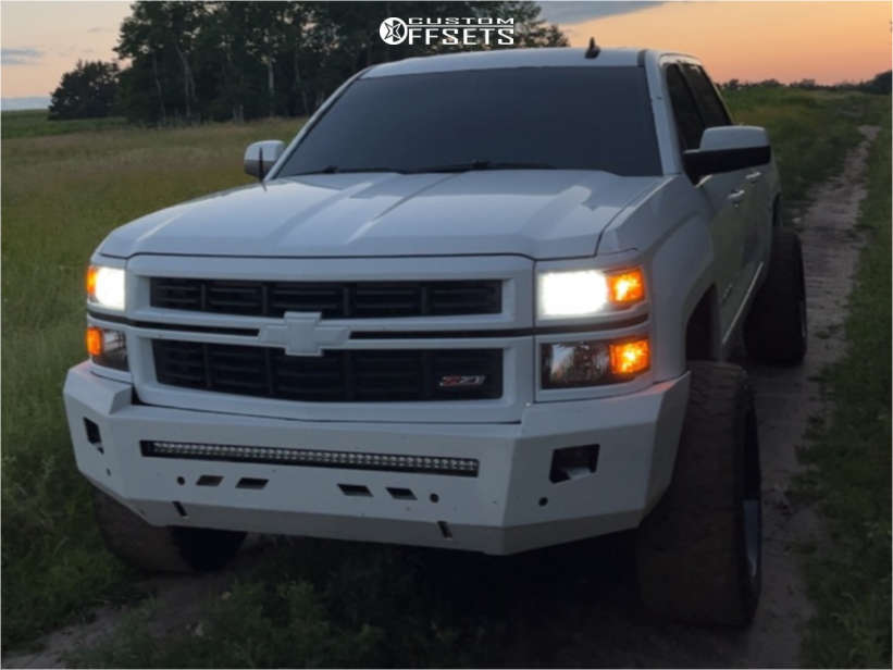 2015 Chevrolet Silverado 1500 with 20x12 -44 Hostile Fury and 33/12 ...
