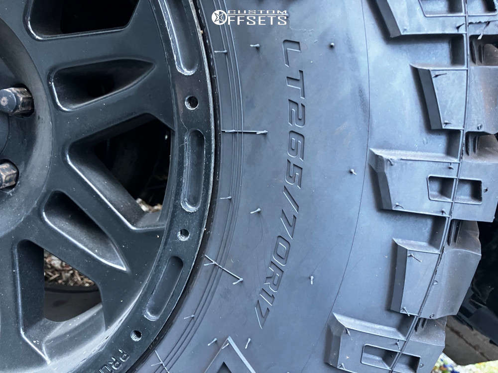 1995 Jeep Cherokee with 17x9 -6 Pro Comp Series 05 and 265/70R17 Cooper ...