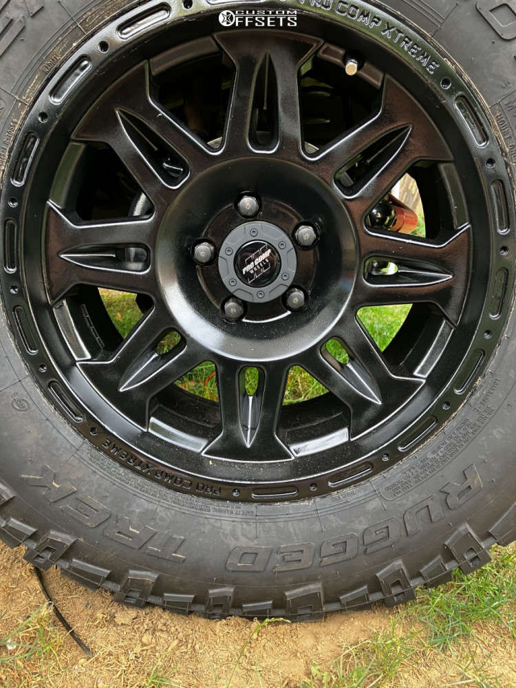 1995 Jeep Cherokee with 17x9 -6 Pro Comp Series 05 and 265/70R17 Cooper ...