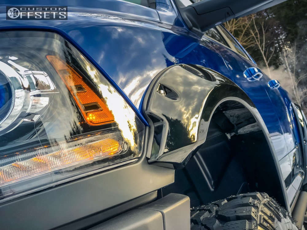 2018 Ram 1500 with 20x10 -24 Grid GD07 and 325/60R20 Goodyear Wrangler ...