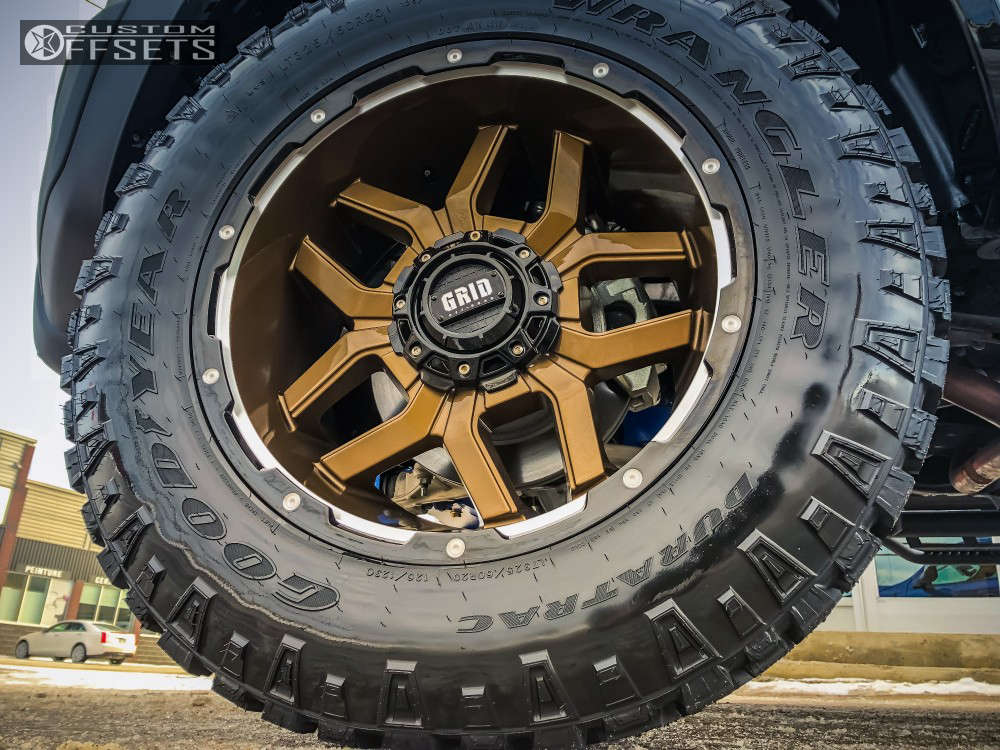 2018 Ram 1500 with 20x10 -24 Grid GD07 and 325/60R20 Goodyear Wrangler ...