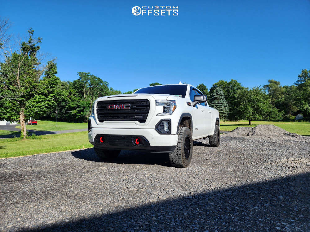 2019 GMC Sierra 1500 with 18x9 -12 Method MR305 and 285/65R18 Falken ...