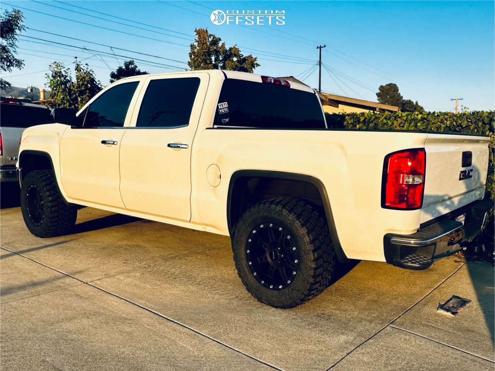 2014 GMC Sierra 1500 with 18x9 0 Pro Comp Series 31 and 33/12.5R18 RBP ...