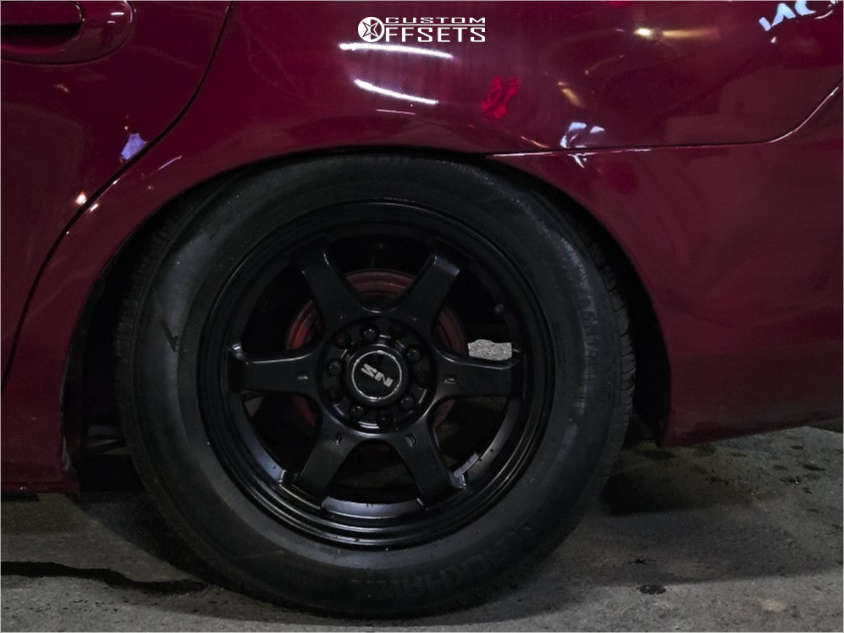 2005 Dodge Neon with 15x6.5 38 NS Ns1507 and 195/65R15 Blackhawk Street ...