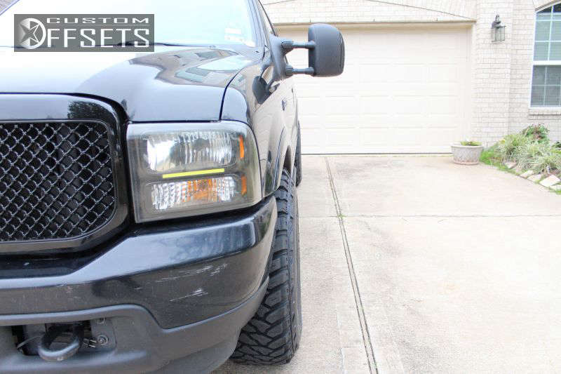 2003 Ford Excursion with 16x10 -25 Rebel Racing Sahara and 285/75R16 ...