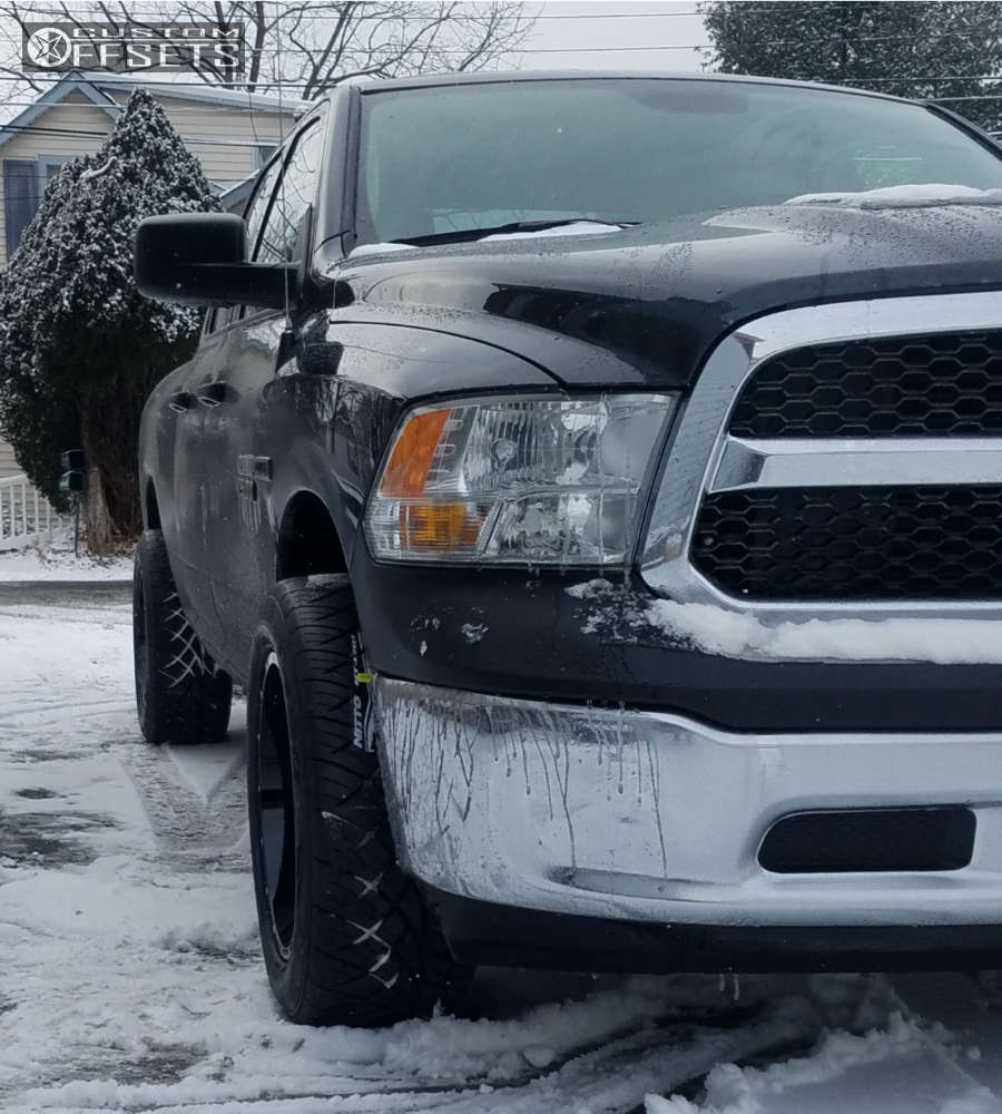 2017 Ram 1500 with 20x10 -19 Tuff T15 and 305/50R20 Nitto NT420V and ...