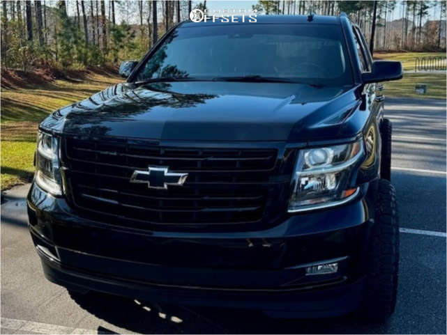 2020 Chevrolet Tahoe with 22x12 -44 TIS 566b and 33/12.5R22 Venom Power ...