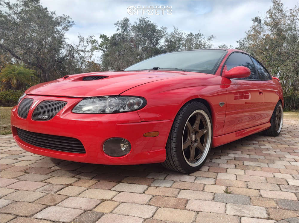 2005 Pontiac GTO with 18x8.5 30 ESR Ap6 and 235/40R18 Firestone ...