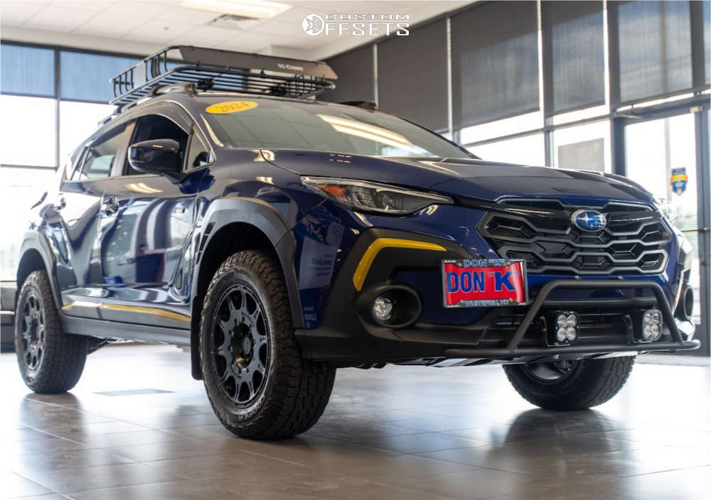 2024 Subaru Crosstrek with 17x8 38 Method Mr502 and 235/65R17 Cooper ...