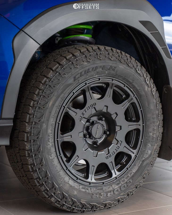 2024 Subaru Crosstrek with 17x8 38 Method Mr502 and 235/65R17 Cooper ...