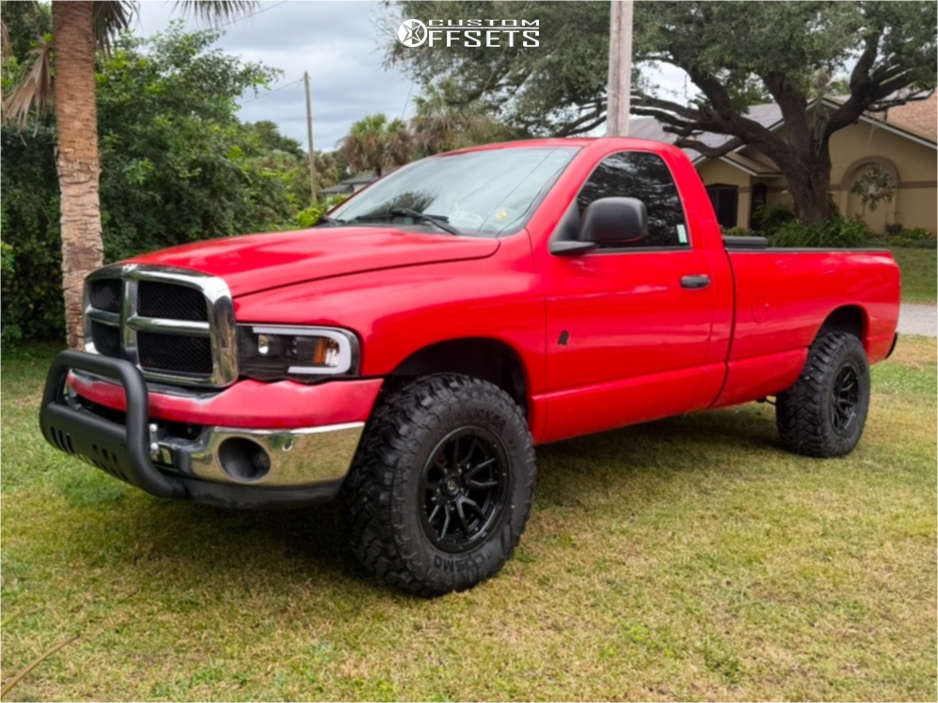 2004 Dodge Ram 1500 with 18x9 -12 Fuel Rebel 5 and 35/12.5R18 Cosmo Mud ...
