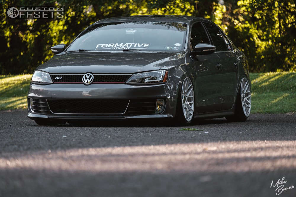 2014 Volkswagen Jetta with 18x9.5 35 Rotiform Rse and 215/40R18 Nitto ...