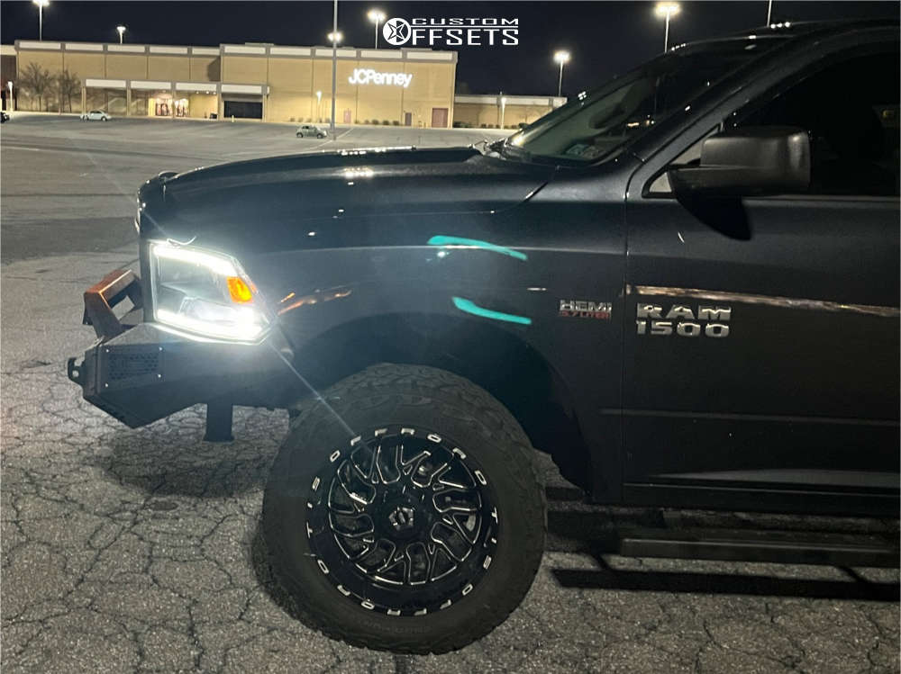 2018 Ram 1500 with 20x12 -44 TIS 544bm and 33/12.5R20 Venom Power Terra ...