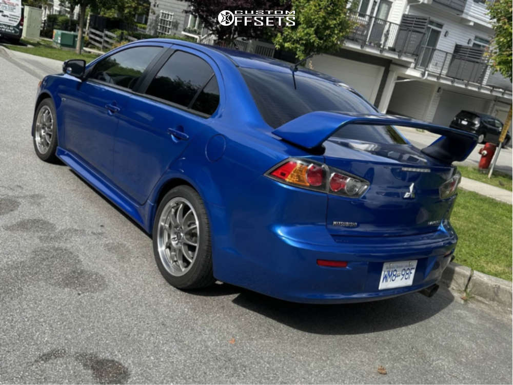 2015 Mitsubishi Lancer with 17x7 38 Enkei J10 and 215/45R17 Nitto ...