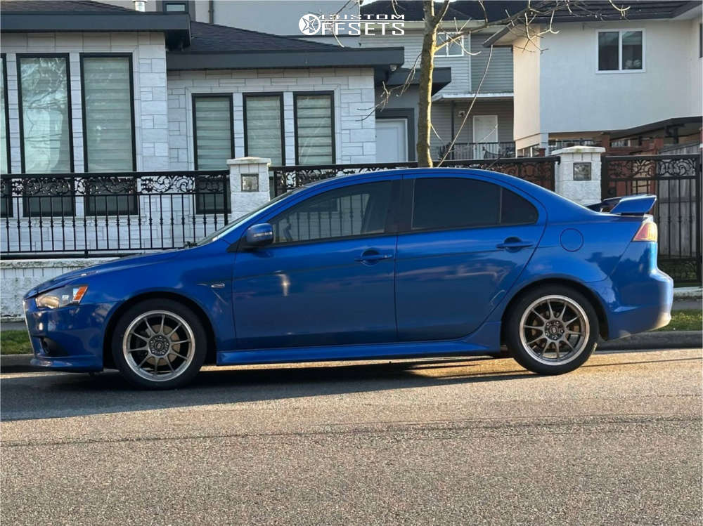 2015 Mitsubishi Lancer with 17x7 38 Enkei J10 and 215/45R17 Nitto ...