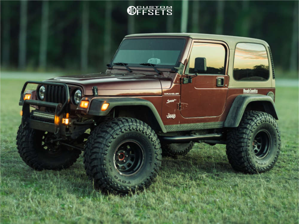 2002 Jeep TJ with 15x10 -39 Rough Country Steel Wheel and 37/14.5R15 ...