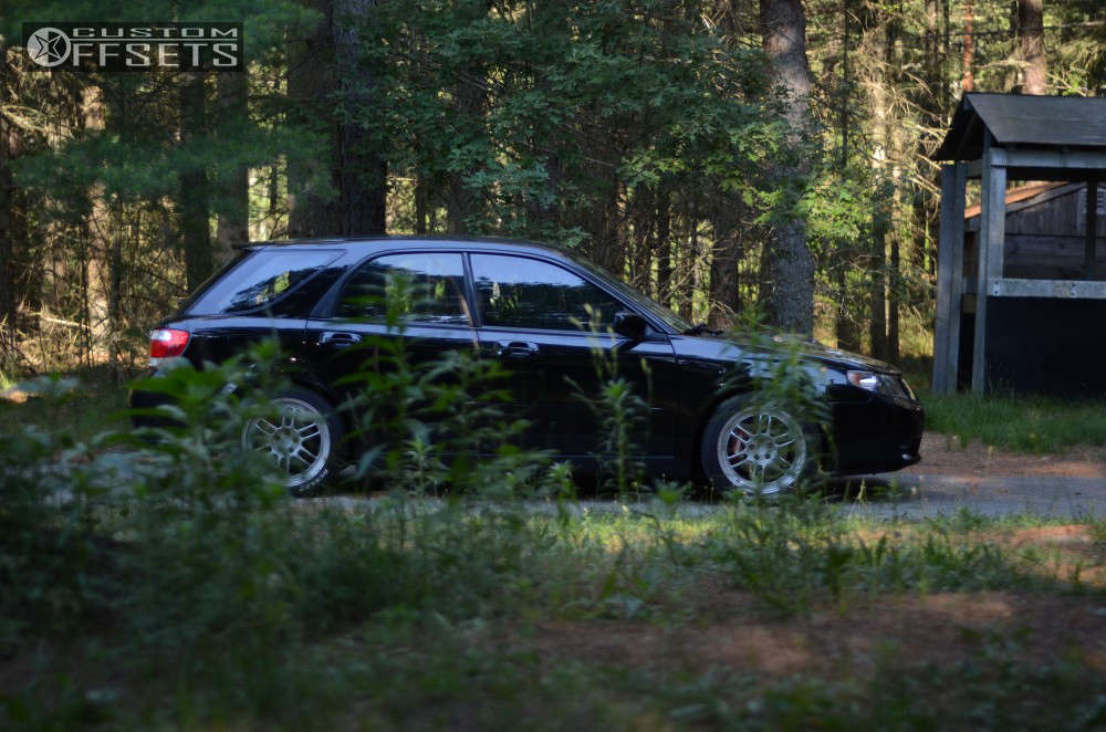 2005 Saab 9-5 with 17x8 45 Enkei RPF1 and 235/45R17 Dunlop Sp Sport ...
