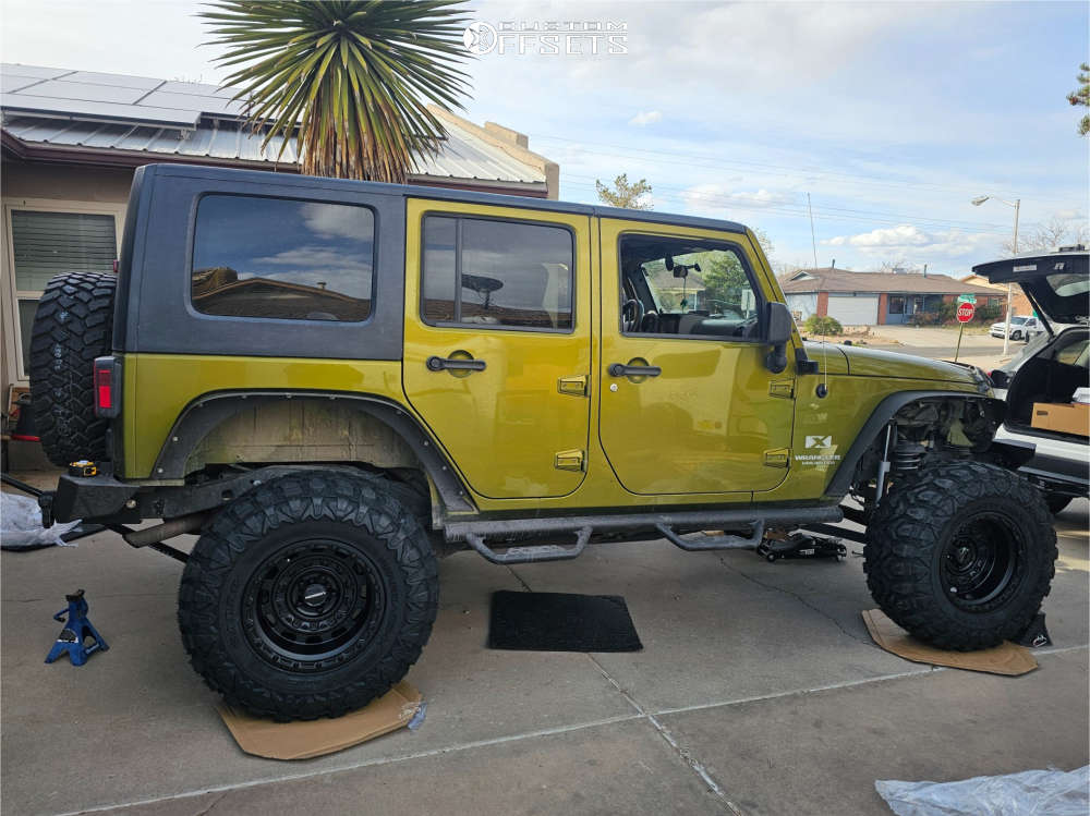 2009 Jeep Wrangler with 17x10 -25 Vision Tactical and 35/12.5R17 Radar ...