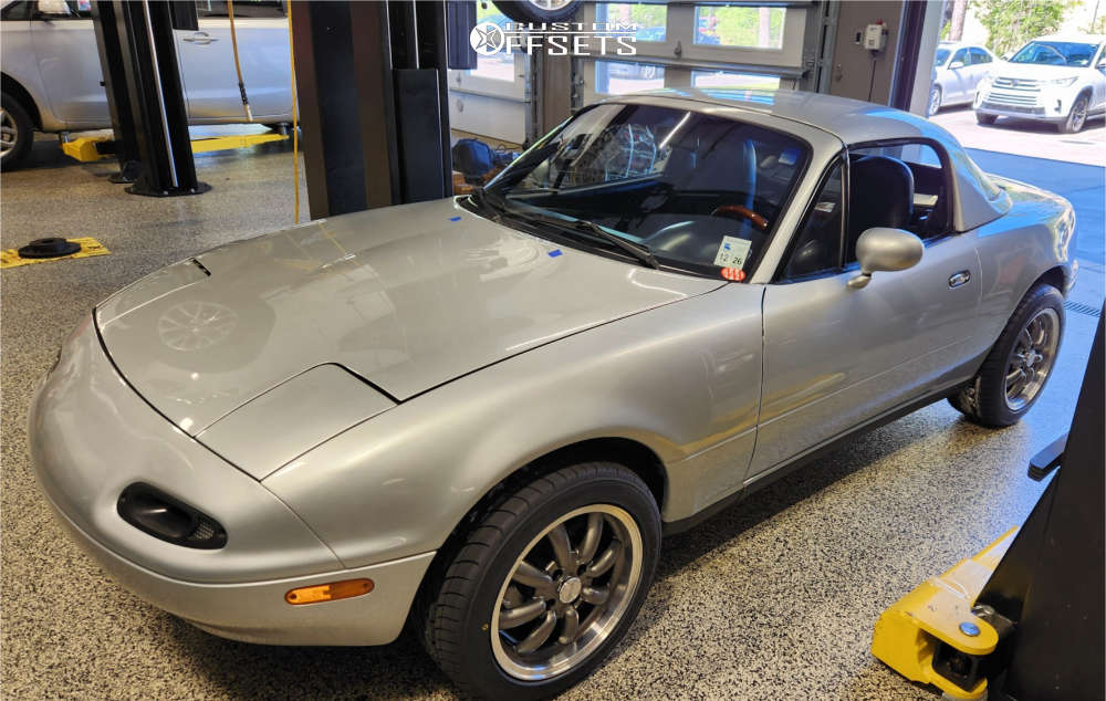 1992 Mazda Miata with 15x7 20 Konig Rewind and 205/50R15 Nitto Neo Gen ...