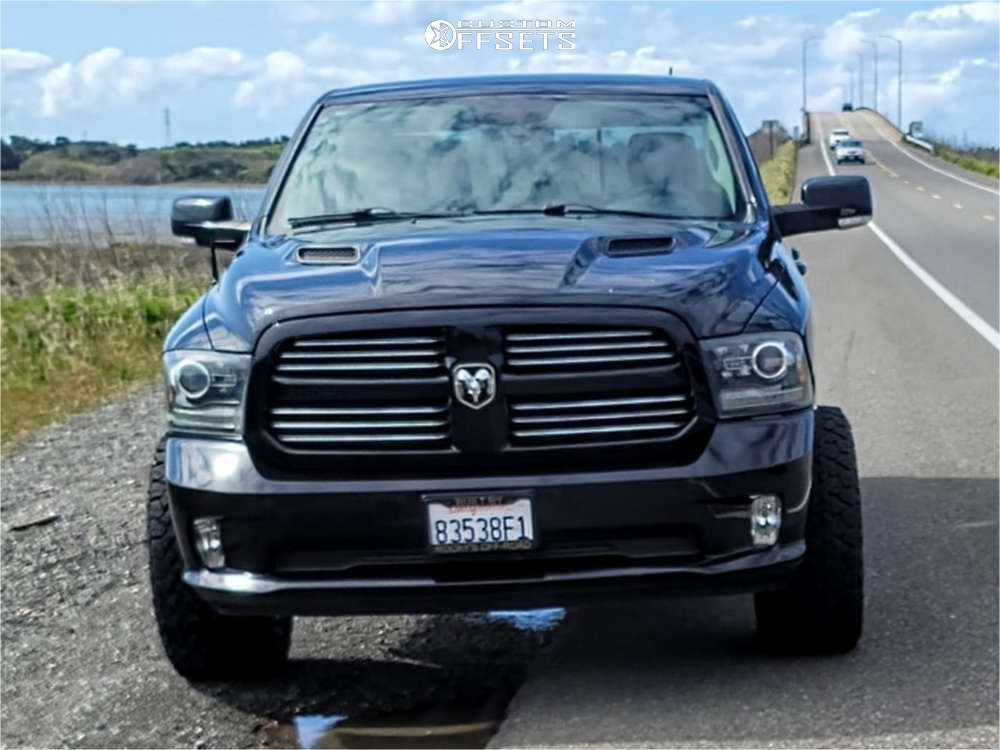 2014 Ram 1500 with 20x12 -51 Vision Spyder and 33/12.5R20 Venom Power ...