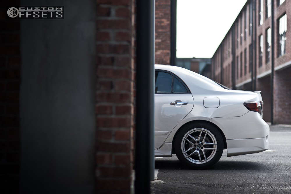 2009 Toyota Corolla with 17x7.5 35 Enkei Sc37 and 215/50R17 Falken ...