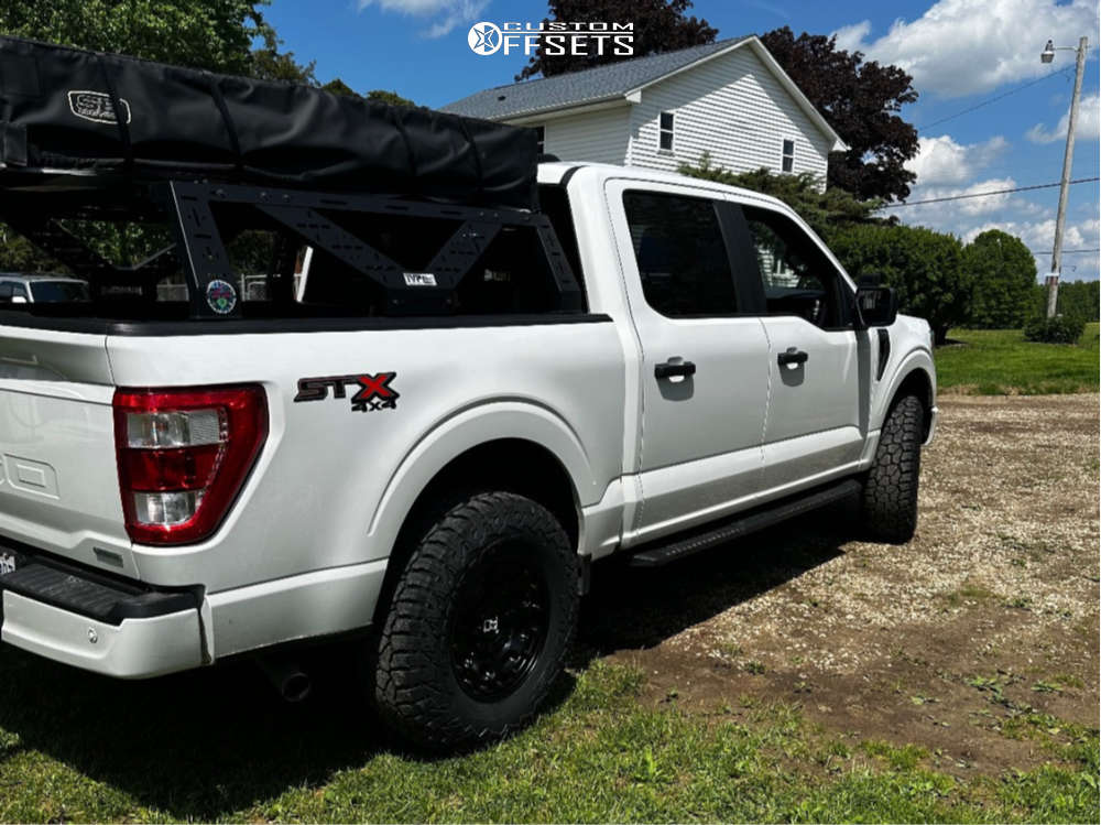 2022 Ford F-150 with 18x9 0 Black Rhino Atlas and 295/70R18 Falken ...
