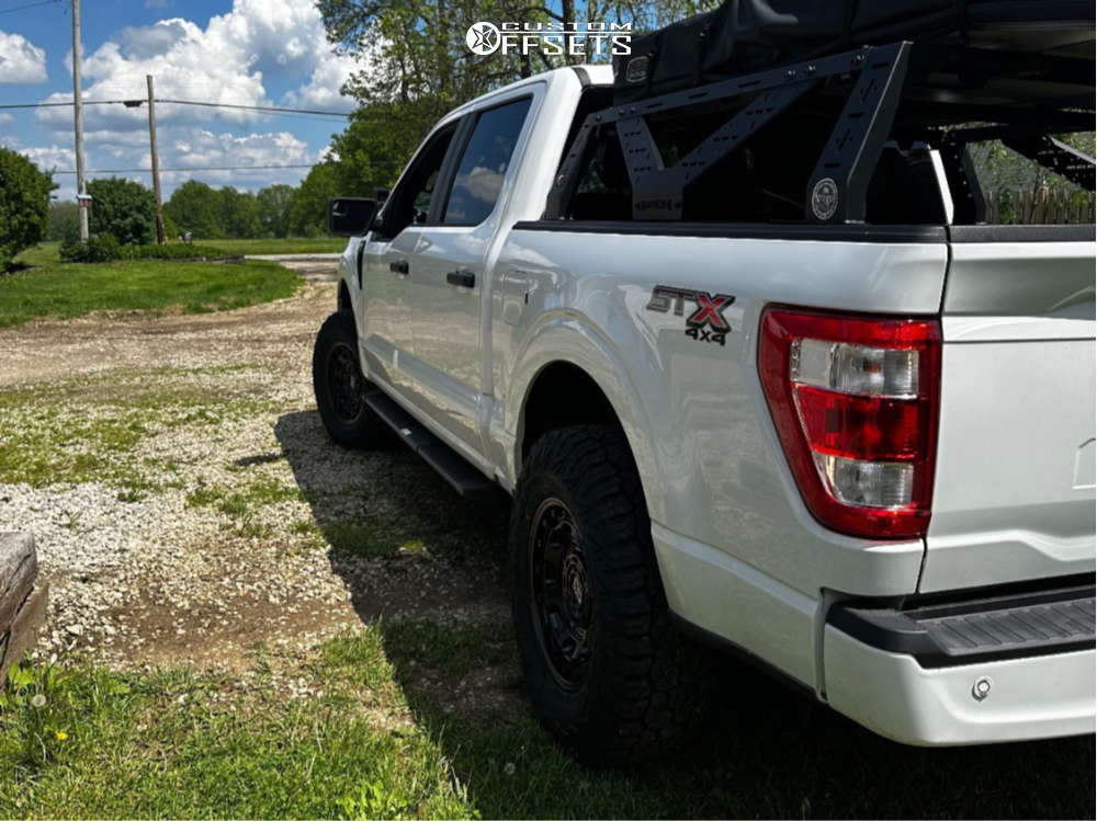 2022 Ford F-150 with 18x9 0 Black Rhino Atlas and 295/70R18 Falken ...