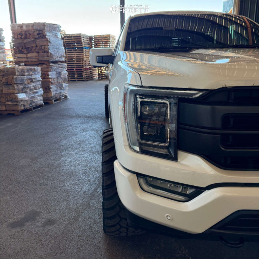 2022 Ford F-150 with 22x10 -19 Vision Brawl and 33/12.5R22 AMP Mud Terrain Attack Mt A and ...