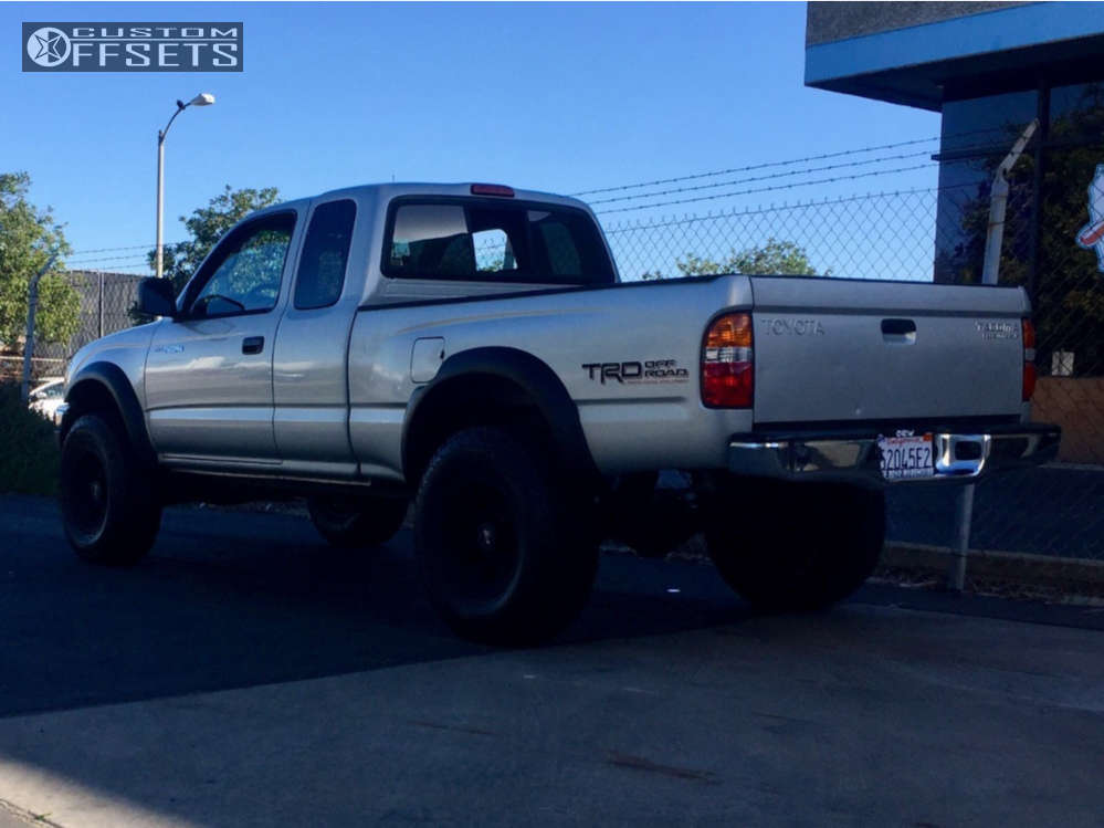 2002 Toyota Tacoma with 16x8 -12 Pro Comp Series 69 and 265/75R16 ...