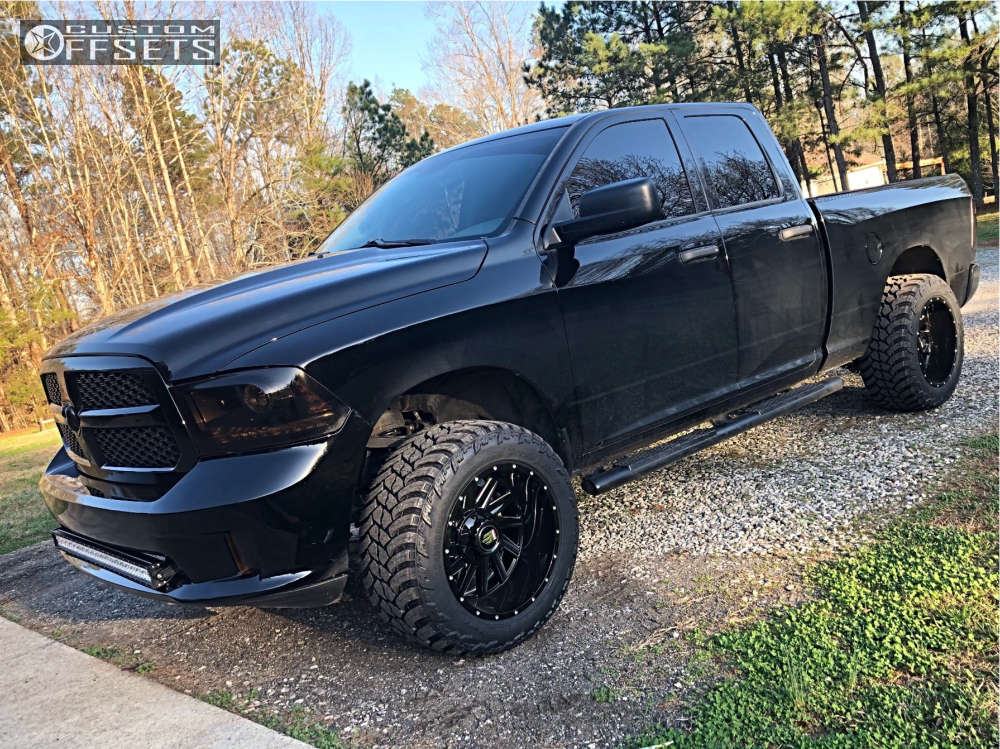 2014 Ram 1500 with 20x12 -44 American Truxx Striker and 305/55R20 AMP Mud Terrain Attack MT A ...