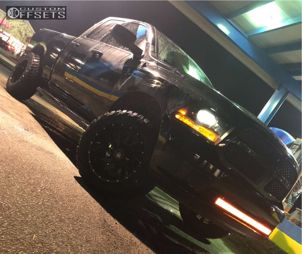 2014 Ram 1500 with 20x12 -44 American Truxx Striker and 305/55R20 AMP Mud Terrain Attack MT A ...
