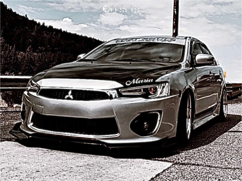 2016 Mitsubishi Lancer with 18x9.5 22 ESR Sr01 and 225/40R18 Lexani ...