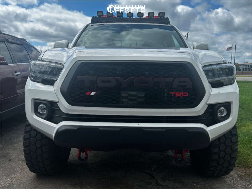 2023 Toyota Tacoma with 16x8 10 Tuff T02 and 33/12.5R16 RBP Repulsor Xt ...