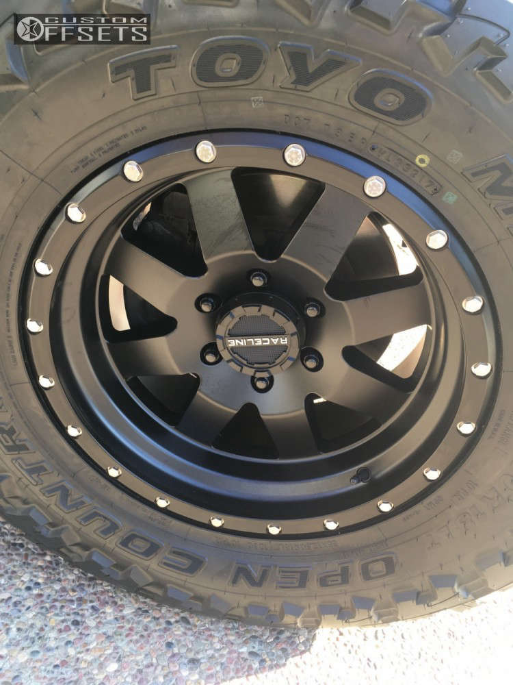 2014 GMC Sierra 1500 with 18x9 -12 Raceline Defender and 35/12.5R18 ...