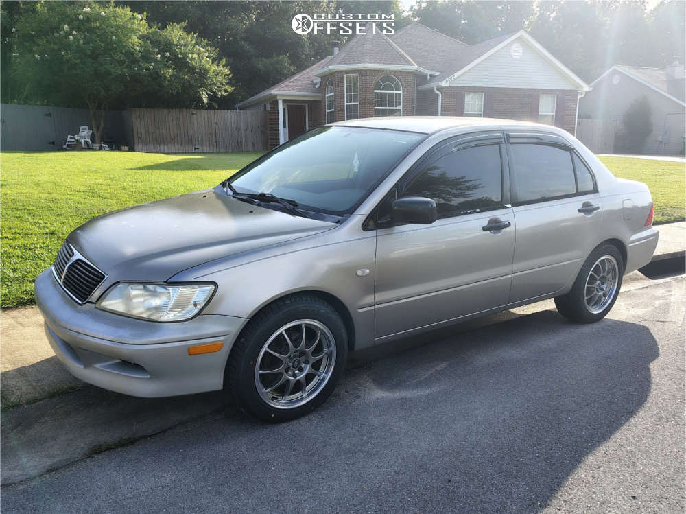 2002 Mitsubishi Lancer with 16x7 42 Enkei J10 and 205/55R16 Cosmo Mucho ...