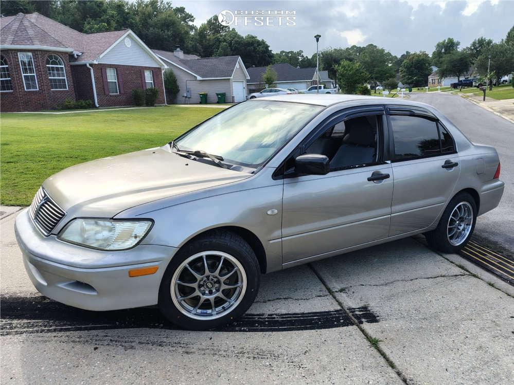 2002 Mitsubishi Lancer with 16x7 42 Enkei J10 and 205/55R16 Cosmo Mucho ...