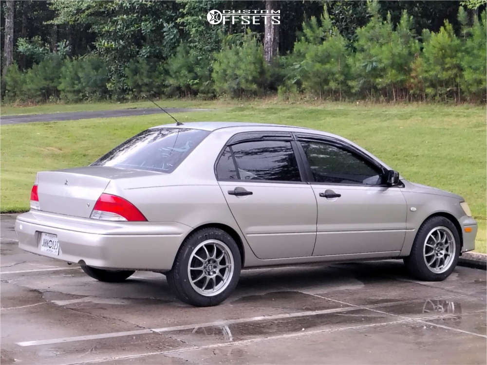 2002 Mitsubishi Lancer with 16x7 42 Enkei J10 and 205/55R16 Cosmo Mucho ...