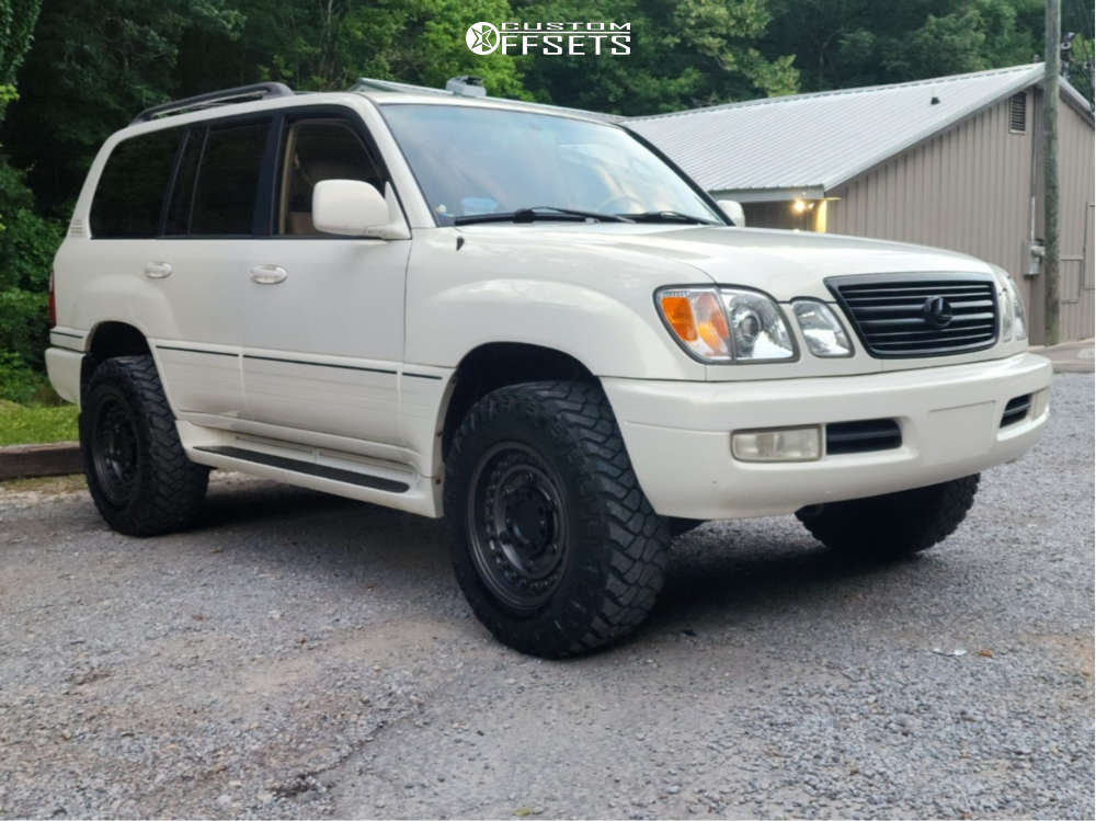2001 Lexus LX470 with 18x9.5 6 Black Rhino Armory and 275/70R18 Maxxis ...