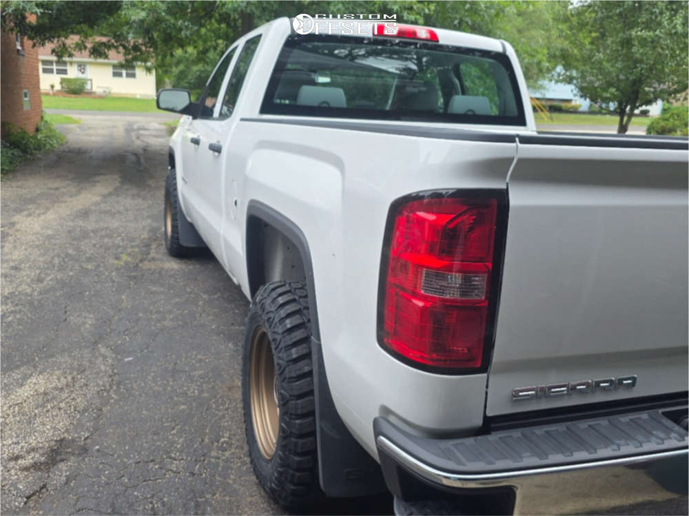2016 GMC Sierra 1500 with 17x9 -12 Rough Country Steel Wheel and 265 ...